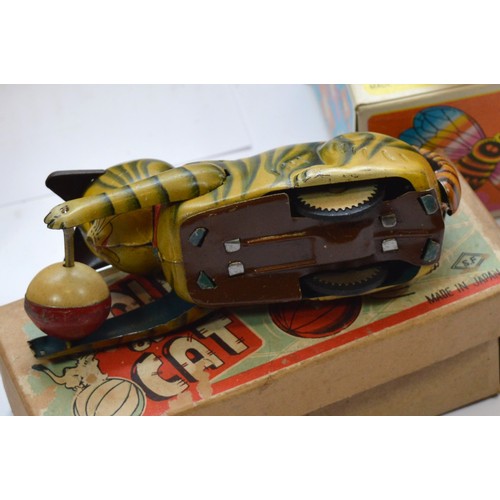 A group of seven 1960s tinplate clockwork toys, made in Japan, to ...