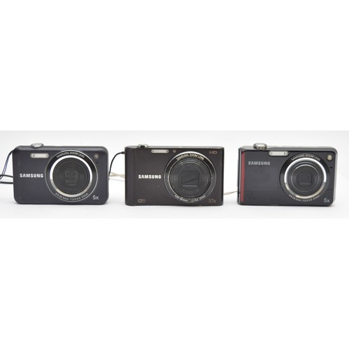 Three digital cameras, a Samsung ST200F, a Samsung PL150 and a Samsung ...