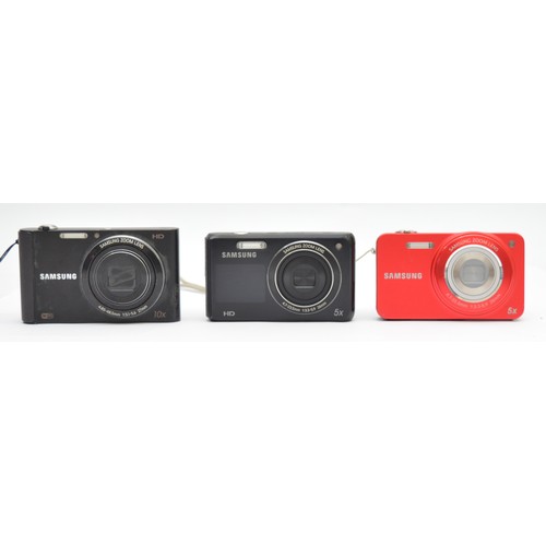 Three digital cameras, a Samsugn ST90, a Samsung ST200F, and a Samsung ...