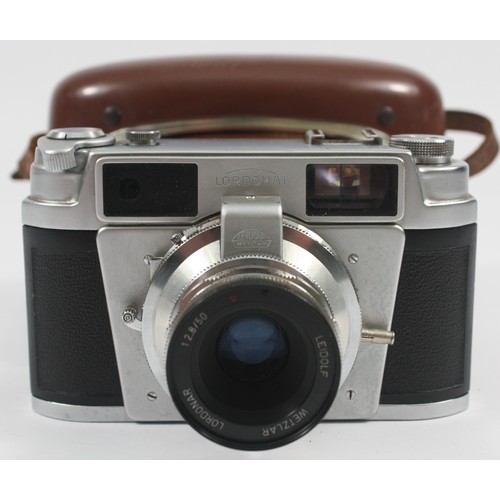 A Leidolf Lordomat rangefinder camera, c. 1950s, in leather case.