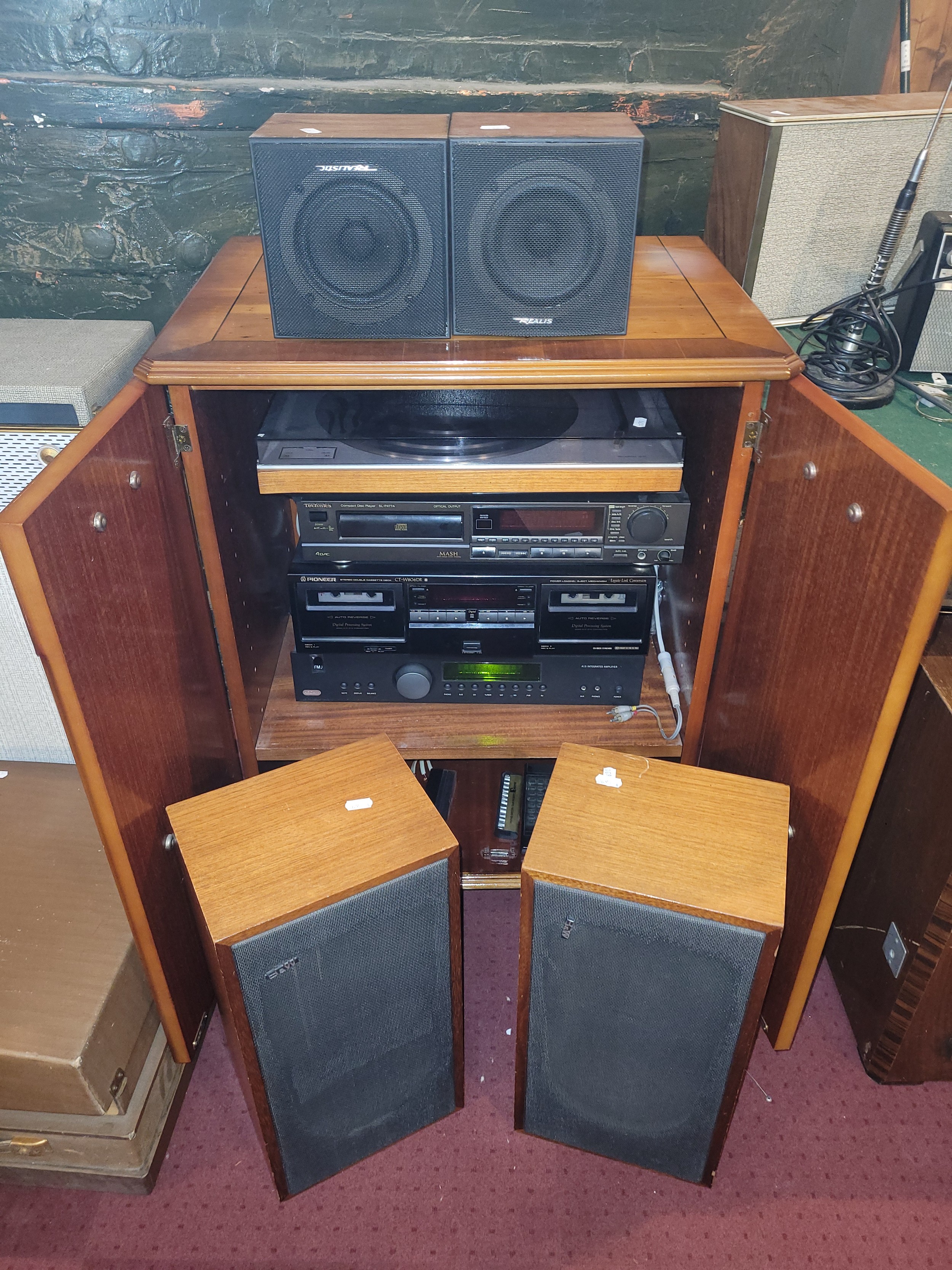 A 1990s Hi-Fi stack system in cabinet, comprising a Bang & Olufsen 1500 turntable, a Technics compac