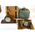 An oak hall mirror with an integrated barometer and clothes brushes ...