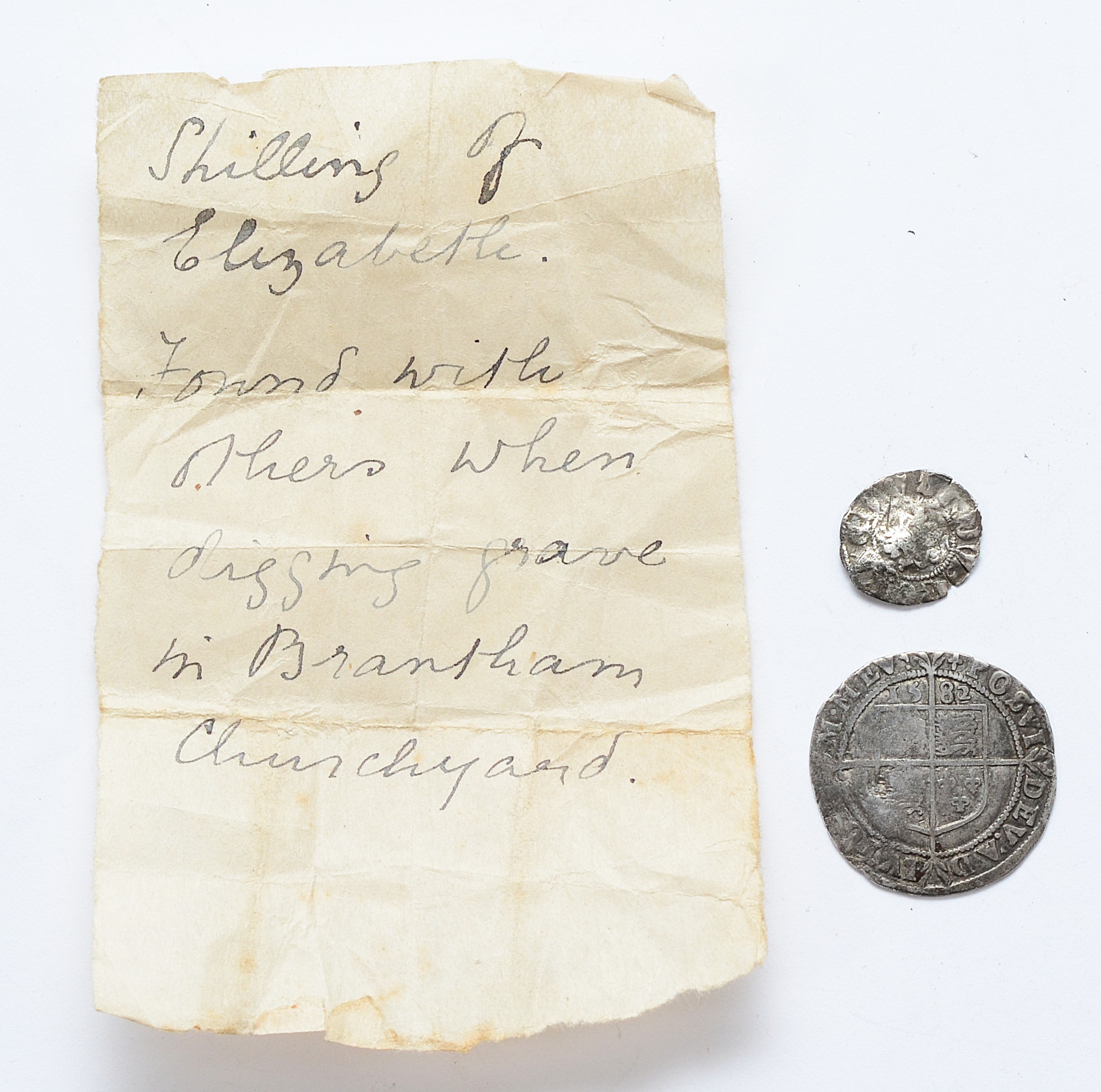 Elizabeth I, hammered sixpence, 1582, together with a note stating ...