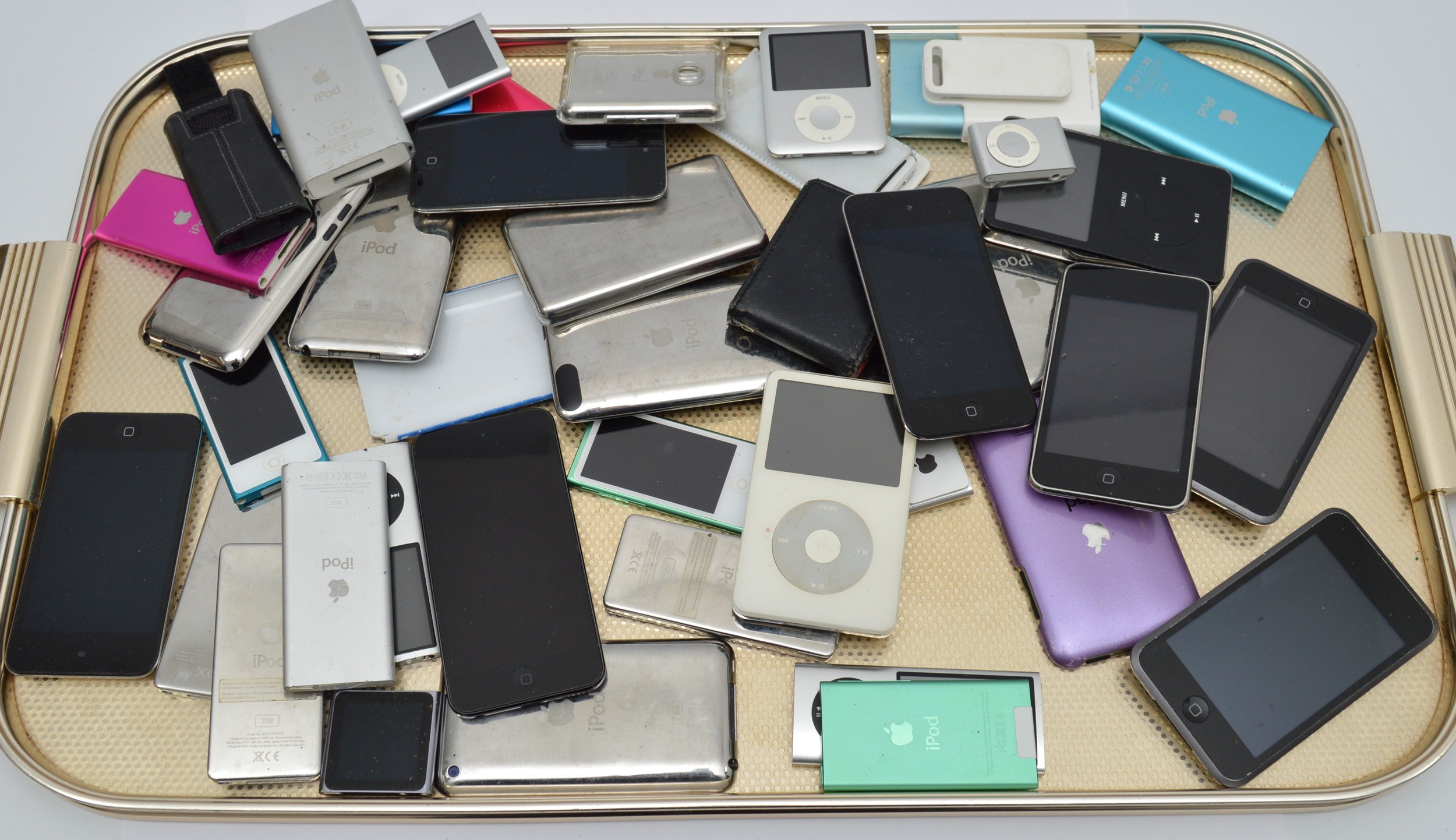 Over twenty Apple iPods, varying models, to include, iPod Mini, Nano ...
