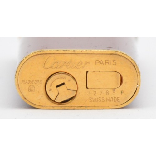 A must de Cartier Paris gas lighter with burgundy enamel casing and ...