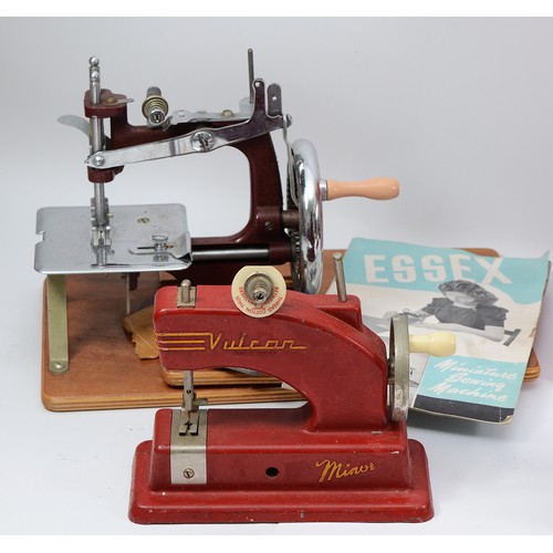 A collection of six childrens sewing machines, boxed and loose to ...