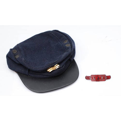 A train drivers cap with metal double arrow (Crows foot) badge and a J ...