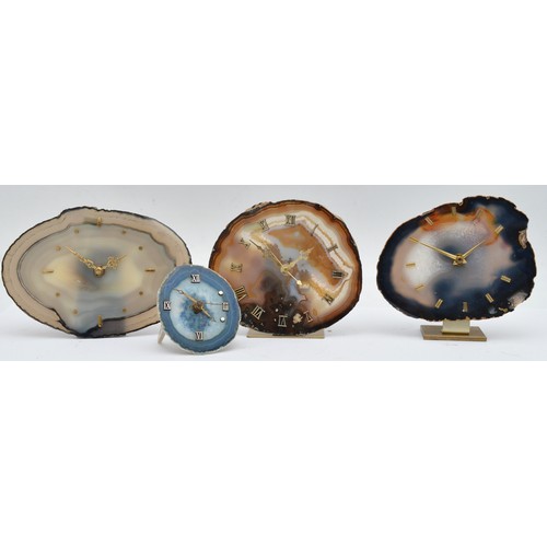 Four agate slice clocks having quartz movements. (4)
