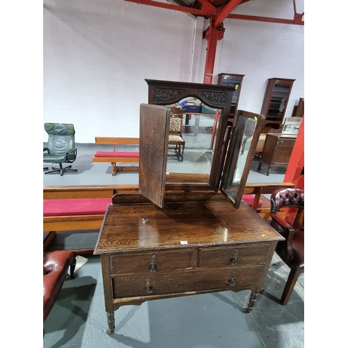 An Oak triple mirror dressing chest