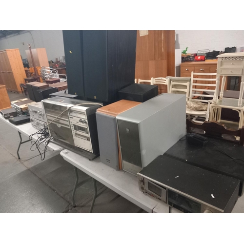 A Sharp dual play turntable, JVC amplifier, JVC cassette deck and ...