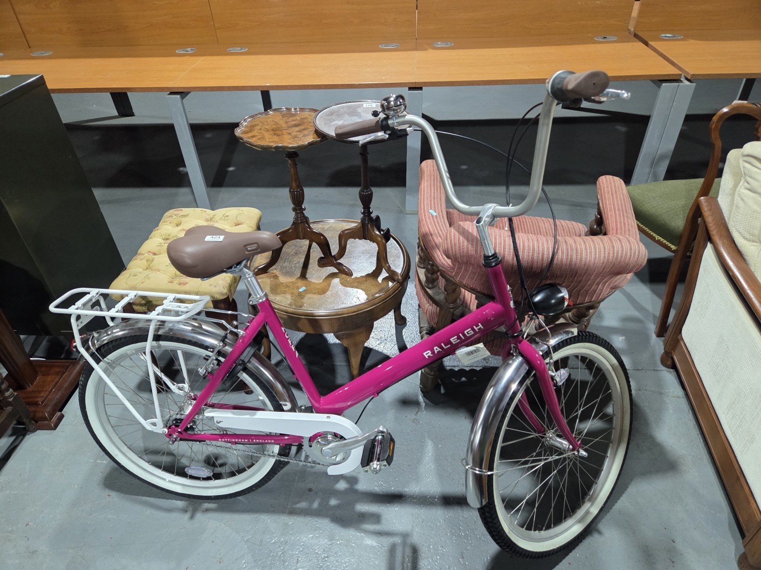 A brand new pink frame ladies Raleigh Hopper bicycle