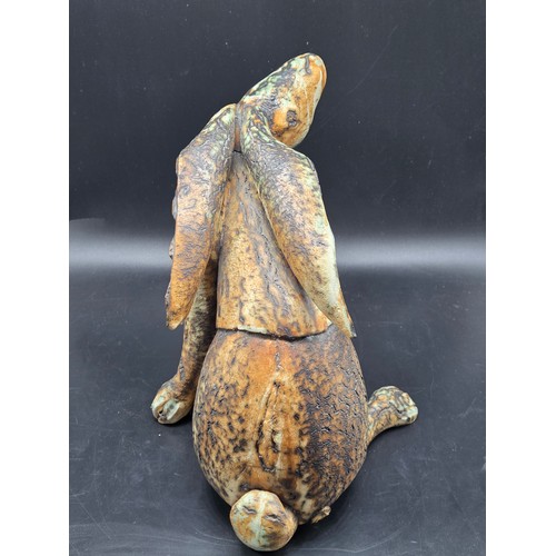 Two large art pottery hares by artist Jan Beeny - the tallest being 40cm