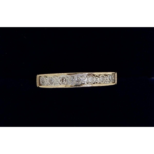 A 9 carat gold ring line set diamond chips, 1.5g, size L