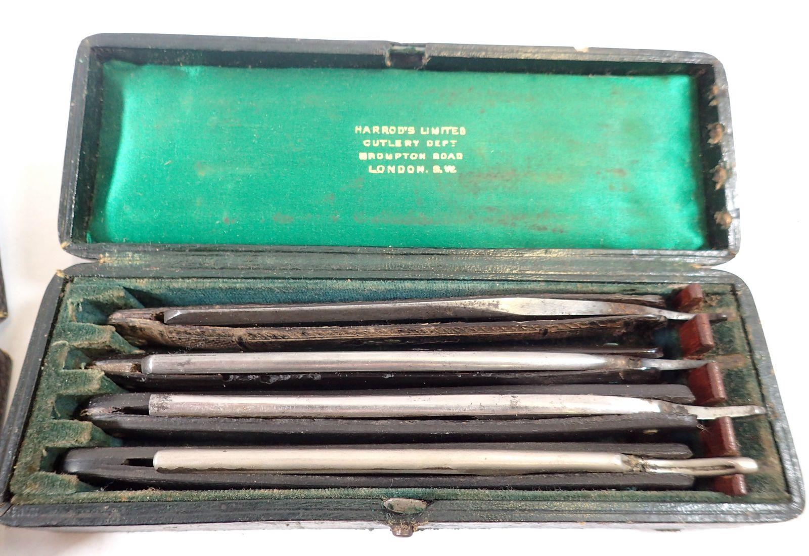 A collection of cut throat razors and safety razors, boxed, including ...