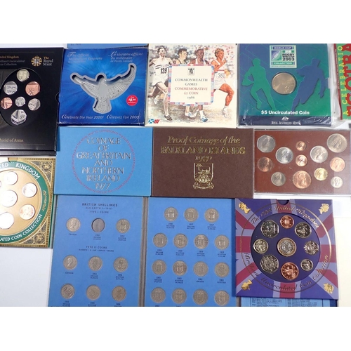 A box of proof coin sets and commemoratives
