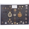 A large collection of military insignia to the Kings Liverpool Regiment ...