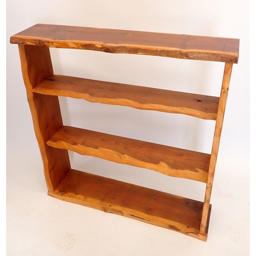 A natural wood yew bookcase, 87cm wide