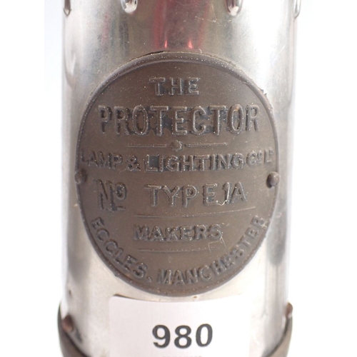 Three various The Protector Lamp & Lighting Co Ltd Eccles miners lamps ...