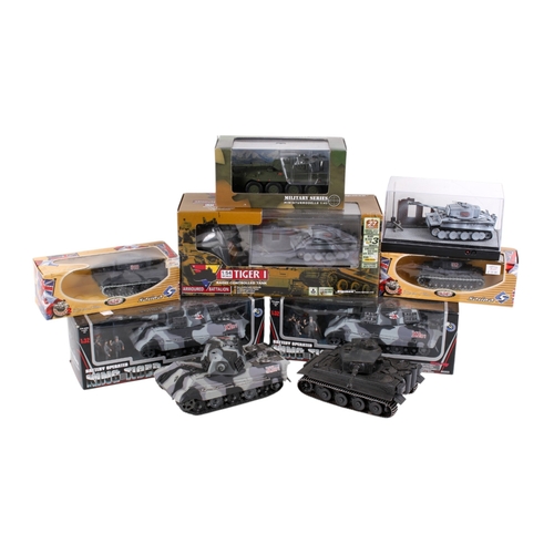 A collection of modern diecast and plastic tanks. Including a boxed ...