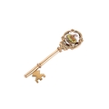 A gold plated silver key. With enamelled motif of a stag in a pen ...