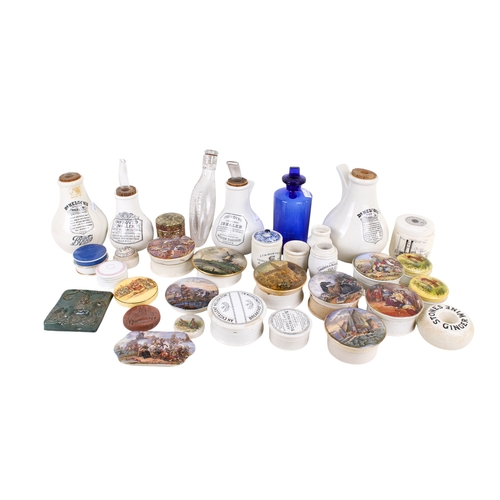 An assortment of vintage 'Pratt' lids, bottles and ceramic 'Inhalers ...