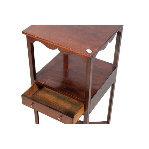 An Edwardian mahogany pot stand of square form. Having a lower tier ...