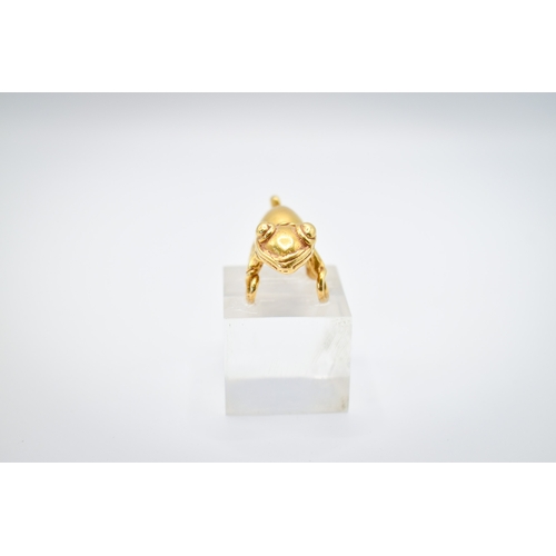 An 18ct gold (tested) 'bug' amulet. With head in the form of a frog ...