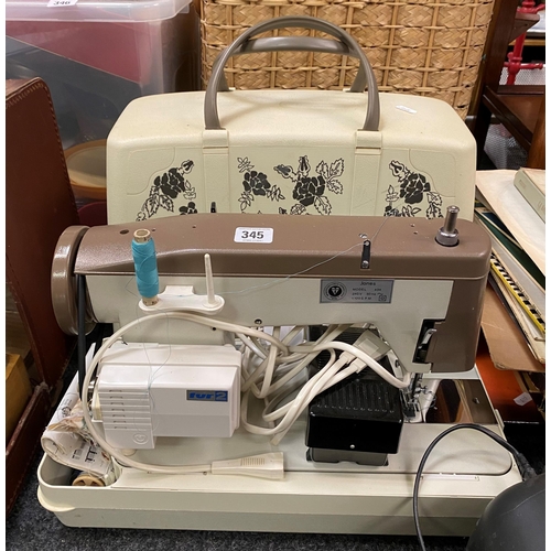 VINTAGE JONES SEWING MACHINE WITH CARRY CASE