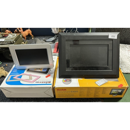 LOGIK 7” DIGITAL FRAME AND A 8’’ KODAK EASY SHARE DIGITAL FRAME