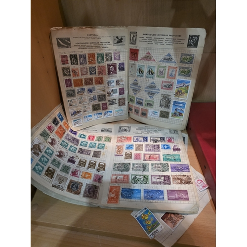 TWO STAMP ALBUMS CONTAINING GLOBAL STAMPS EVERY PAGE FULL
