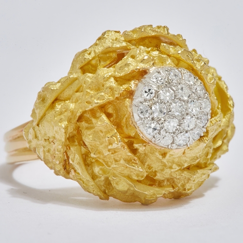 ABSTRACT DIAMOND RING, in 18 ct. gold. The top of abstract textured ...
