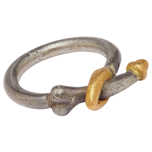 PHALLUS AND VULVA RING, tested as silver and 18 ct. gold. Designed as a ...