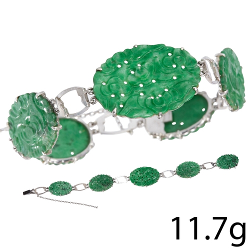 CARVED JADE BRACELET, The jades graduated in size Fine floral carvings ...