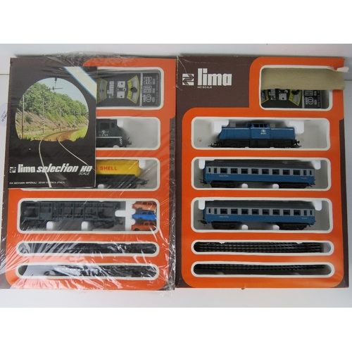 Two HO scale Lima Model railway sets.