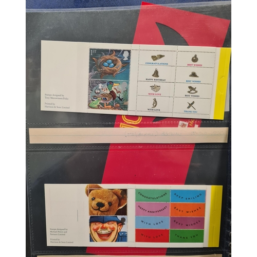 GREETINGS STAMPS BOOKLETS & VARIOUS MACHIN BOOKLETS: Two binders with ...