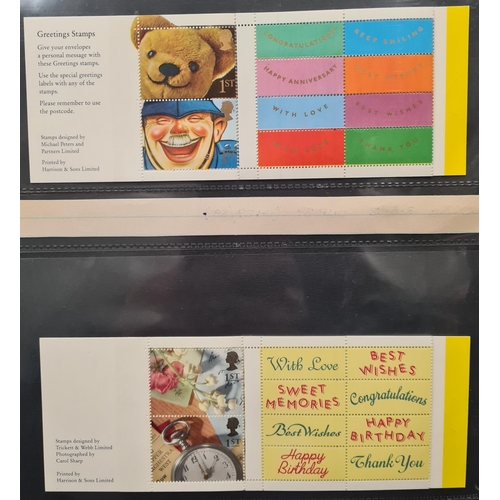 GREETINGS STAMPS BOOKLETS & VARIOUS MACHIN BOOKLETS: Two binders with ...