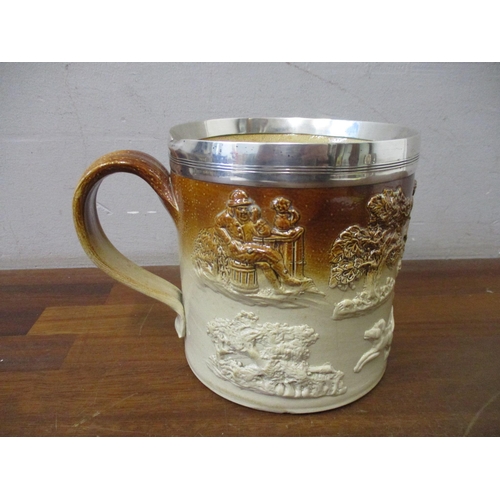 A 19th century two tone stoneware harvest/hunting mug of large ...