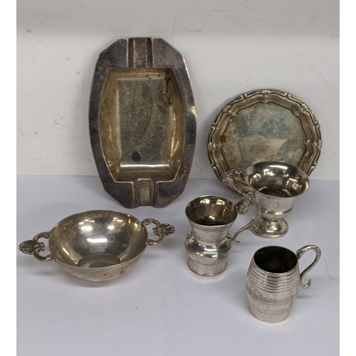 Miniature silver items to include a silver tankard, two single handled ...