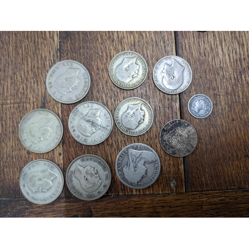 A selection of British and foreign coins and banknotes to include pre ...