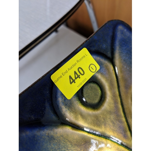 Studio Cellini, an enamelled dish signed and J Pecorini Location: