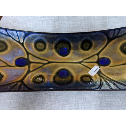 Studio Cellini, an enamelled dish signed and J Pecorini Location: