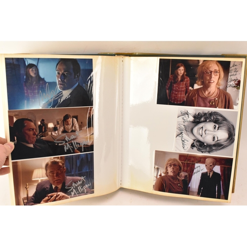A Doctor Who album of autographs on photos, signed by several cast ...