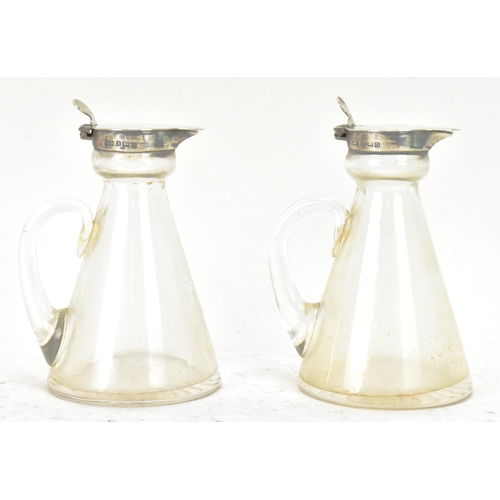 A pair of George V silver mounted whisky tots by Hukin & Heath ...