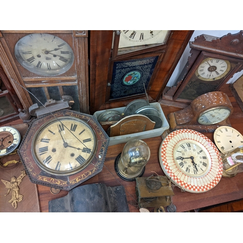 A selection of clocks and clock parts to include a F.W Elliott Post ...