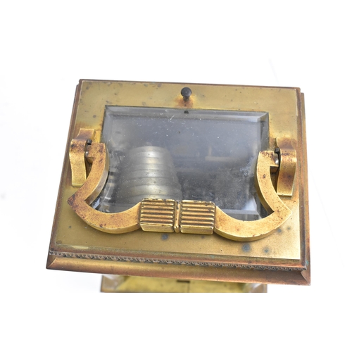 A 19th century English gilt metal repeater goliath carriage clock, the ...
