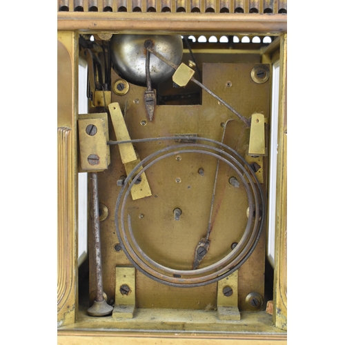 A 19th century English gilt metal repeater goliath carriage clock, the ...
