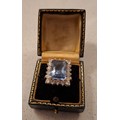 A Ciro large blue topaz ring surrounded by cubic zirconias set in a ...
