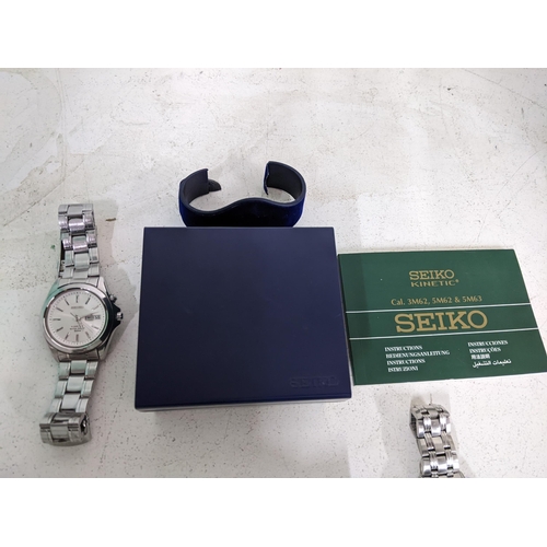 A collection of gents wristwatches to include a boxed Seiko Kinetic, An ...