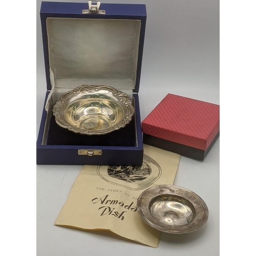 A silver Armada dish hallmarked London 1963 together with a white metal ...
