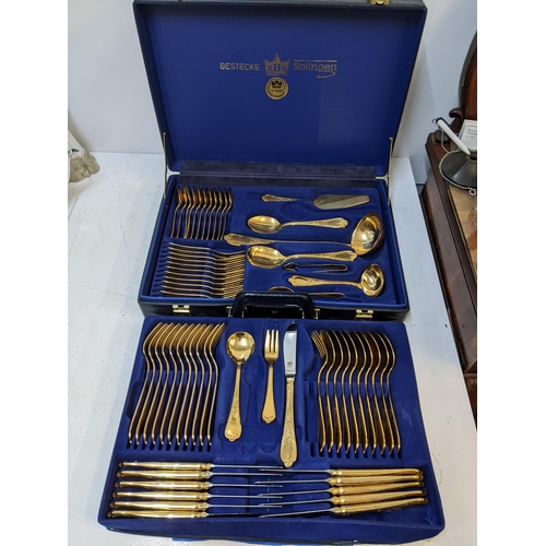 A Bestecke Solingen 24ct gold plated boxed canteen of cutlery. Location ...